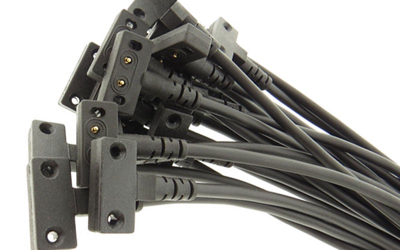 Overmolded Cables Using Pins, Receptacles, and Spring-Loaded Contacts